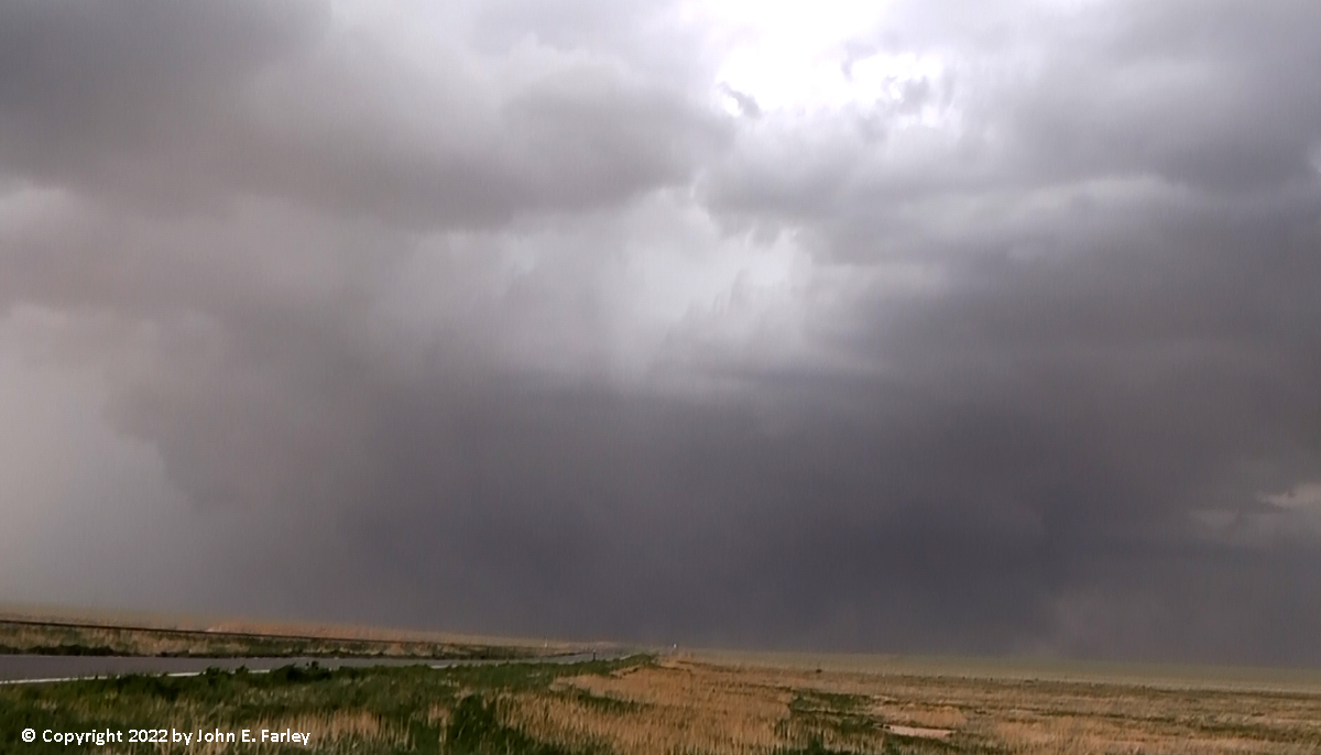 The storm's rear flank downdraft winds lofted a LOT of dust at times: